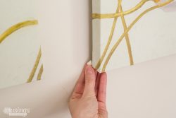 The Unbelievably Easy Picture Hanging Tip You Must Try - Living Well Mom