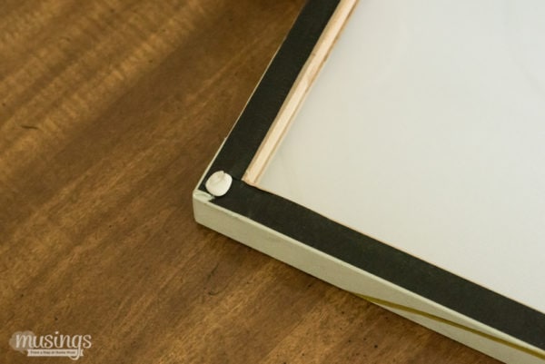 The Unbelievably Easy Picture Hanging Tip You Must Try - Living Well Mom